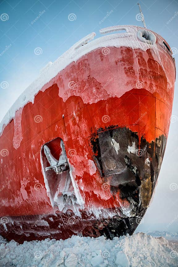 Ship in ice on unloading. stock photo. Image of work - 120831854