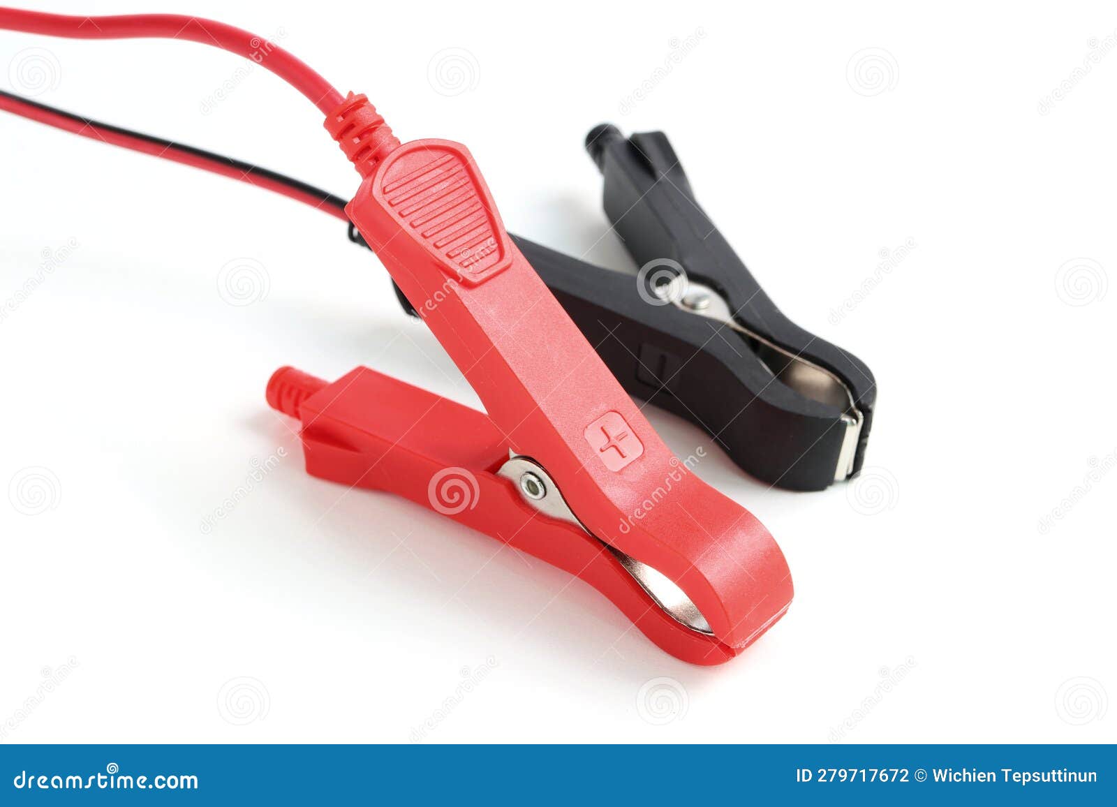 Red Insulated Charging Clips on White Background Stock Photo - Image of ...