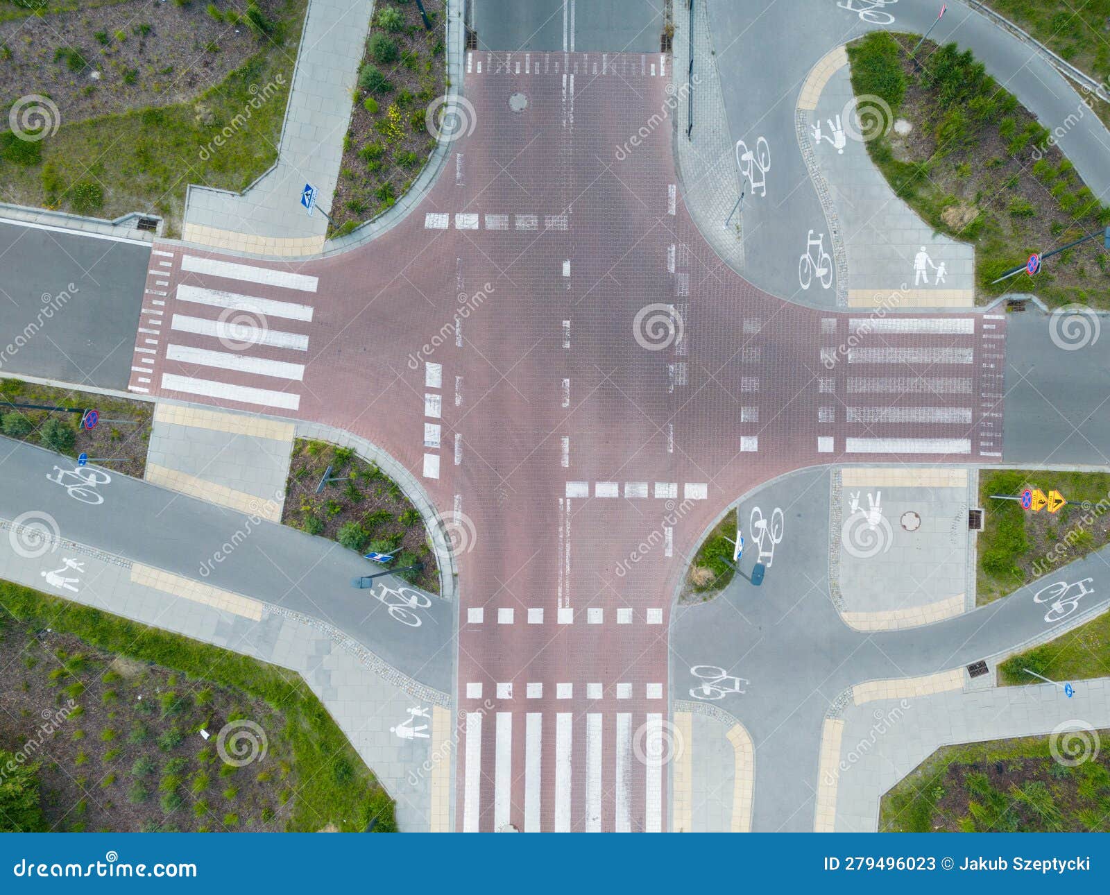 Red Intersection with Pedestrian Crossing and Bicycle Paths Stock Image ...