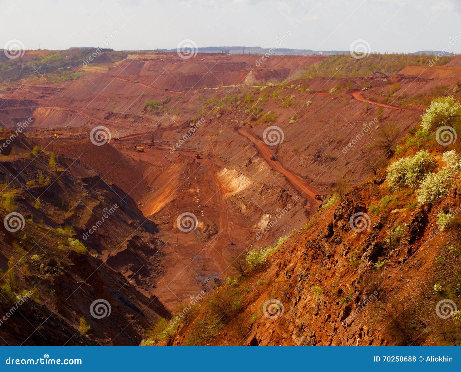 Red iron ore open-pit mine stock photo. Image of industrial - 70250688
