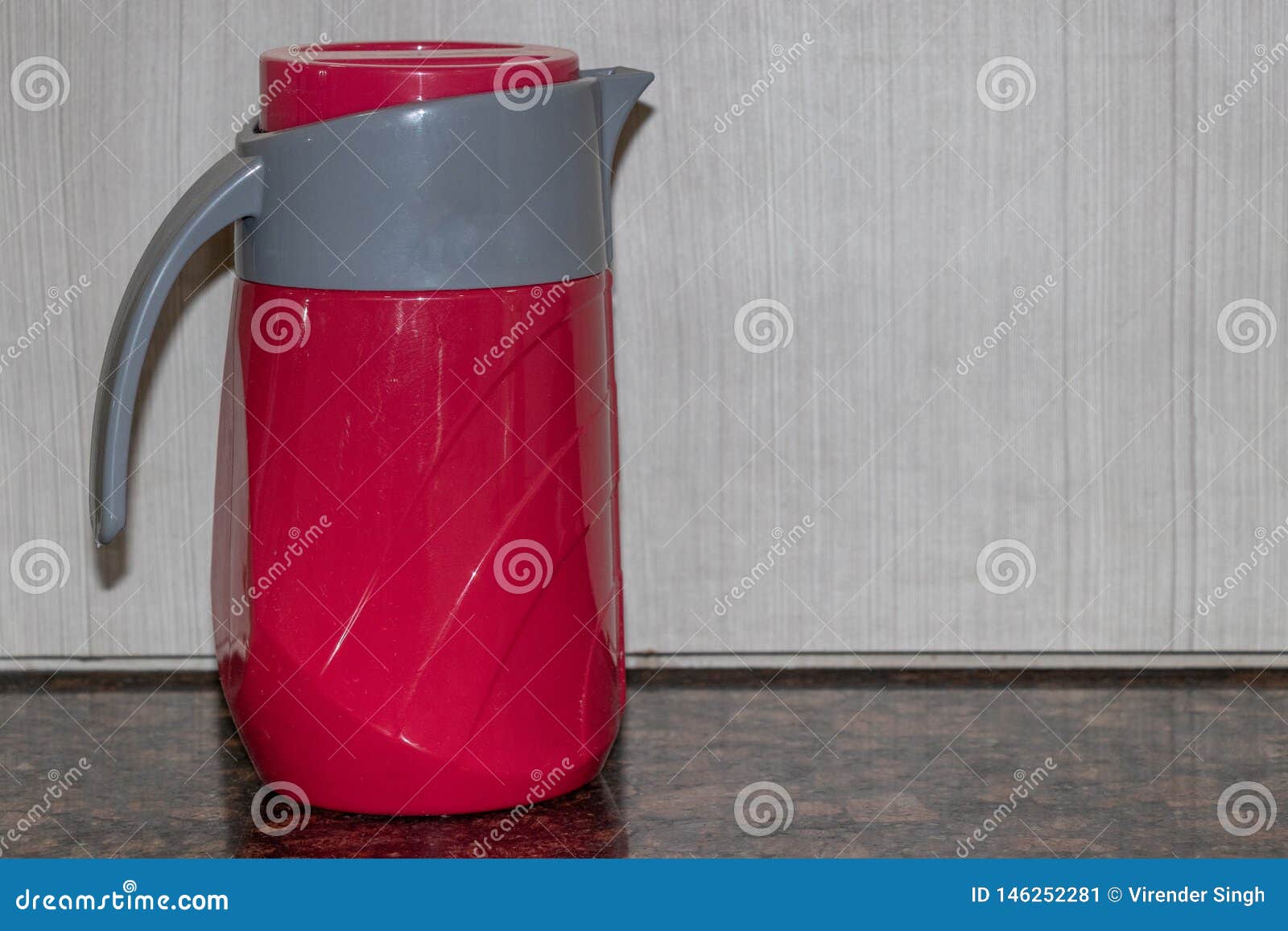 Red jug on table stock image. Image of container, isolated - 146252281