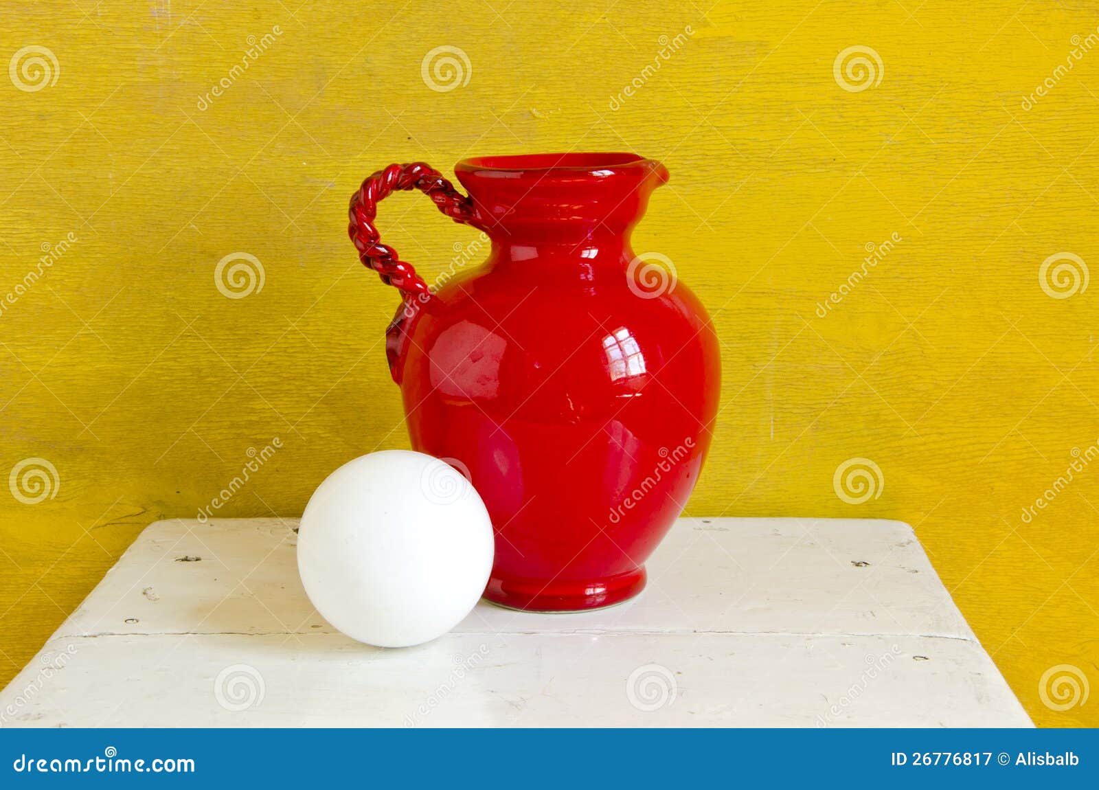 Red Jug and White Ball on Table Stock Image - Image of stilllife, home ...