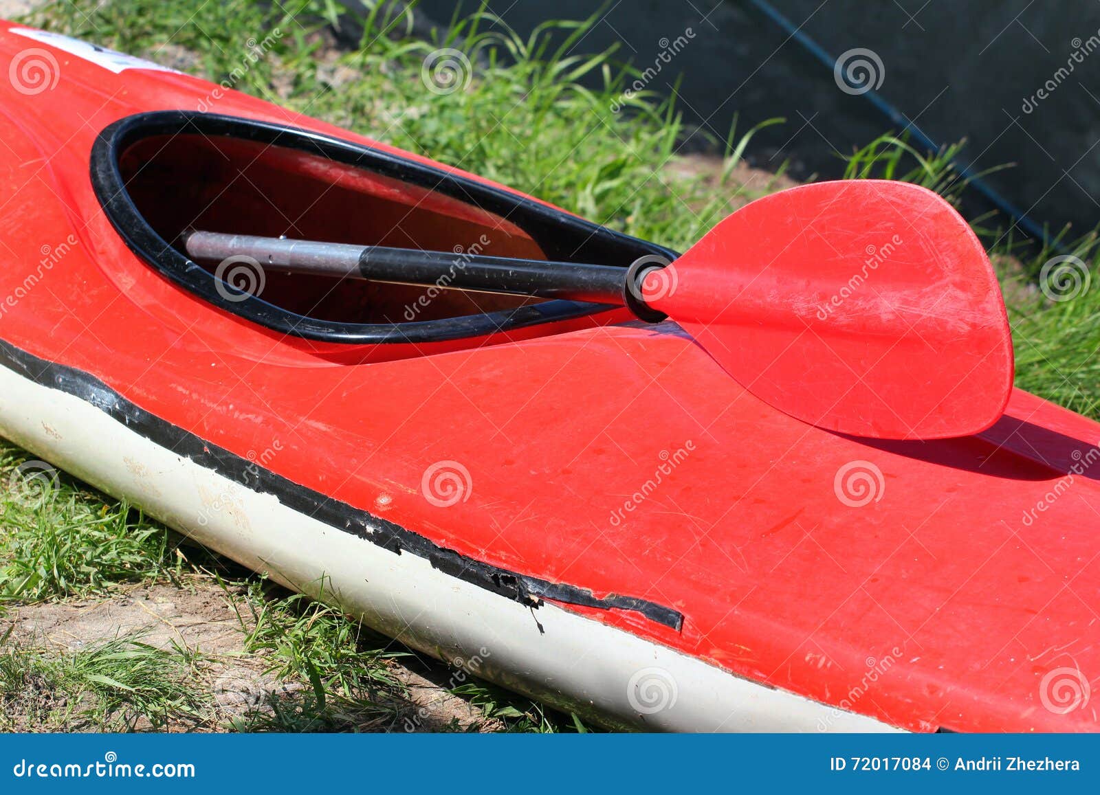 Red Kayak with Paddle on a Beach Stock Photo - Image of beach, detail ...
