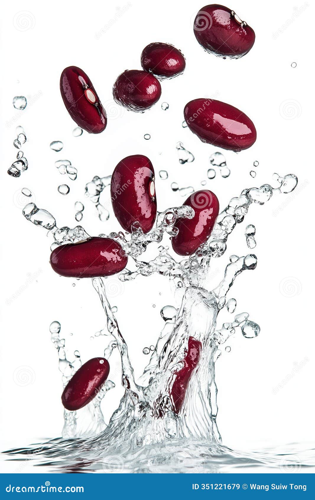 Red Kidney Beans Splashing into Water on White Background Stock ...