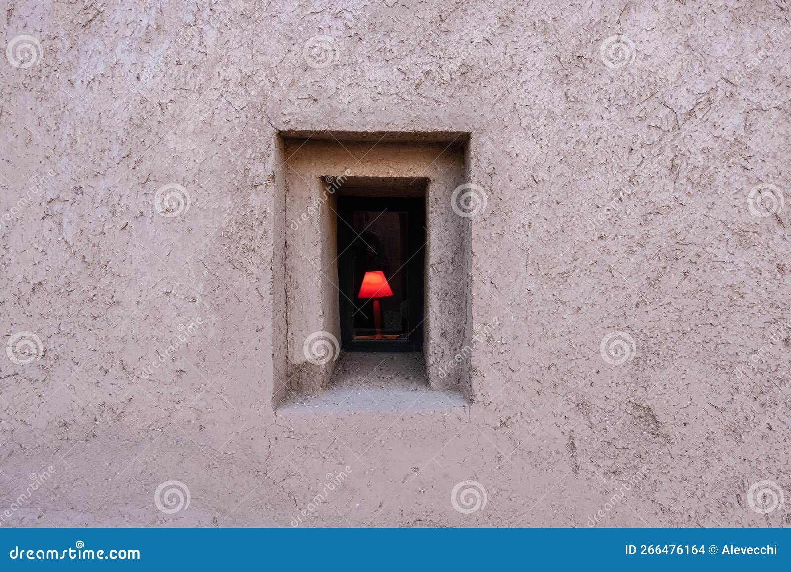 Red Lamp Light on a Window of a Kasbah with Mud Walls Stock Photo ...