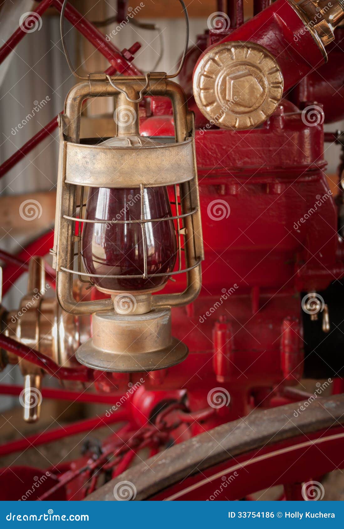 Red Lantern Hangs on 1876 Fire Engine Stock Photo - Image of close ...