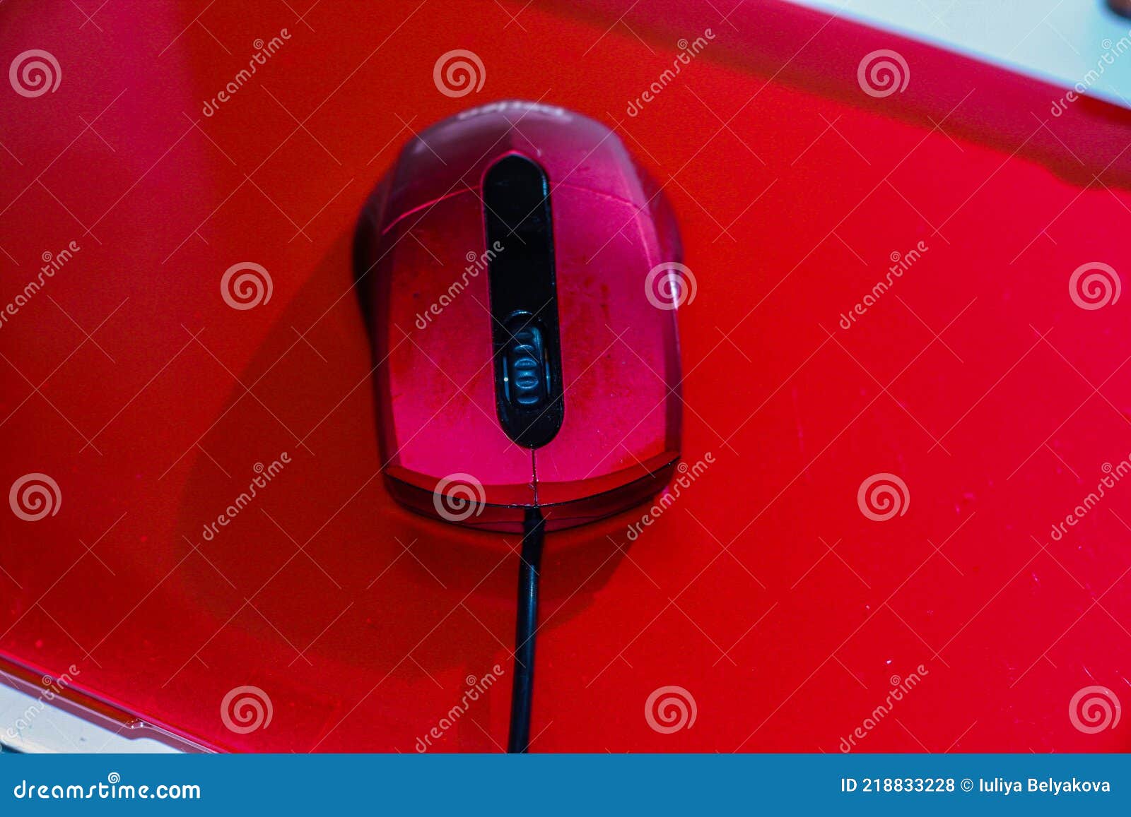 Red laptop with red mouse stock photo. Image of desk - 218833228