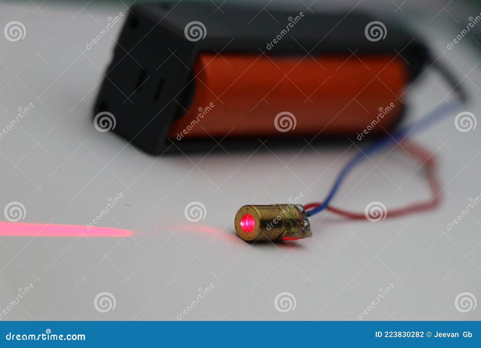 Red Laser Diode with Copper Head Powered by Battery Emitting Laser ...