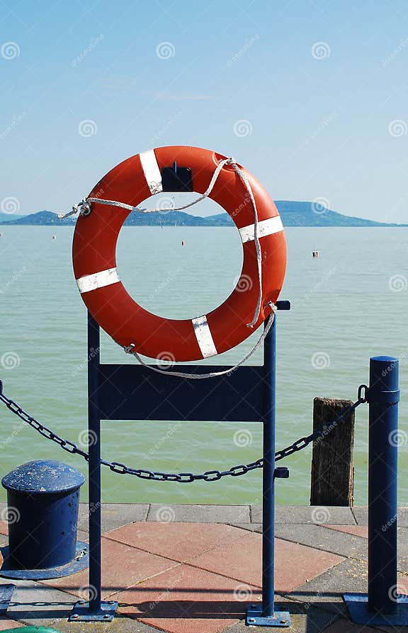 Red Life Ring by Lake stock image. Image of holiday, sunny - 21654261