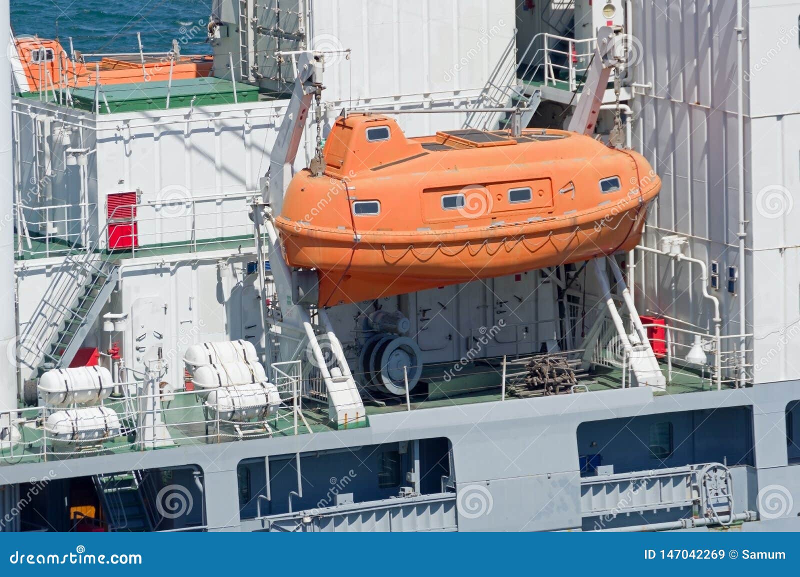 Red Lifeboat Docked To Ship Stock Image - Image of ferry, rescue: 147042269