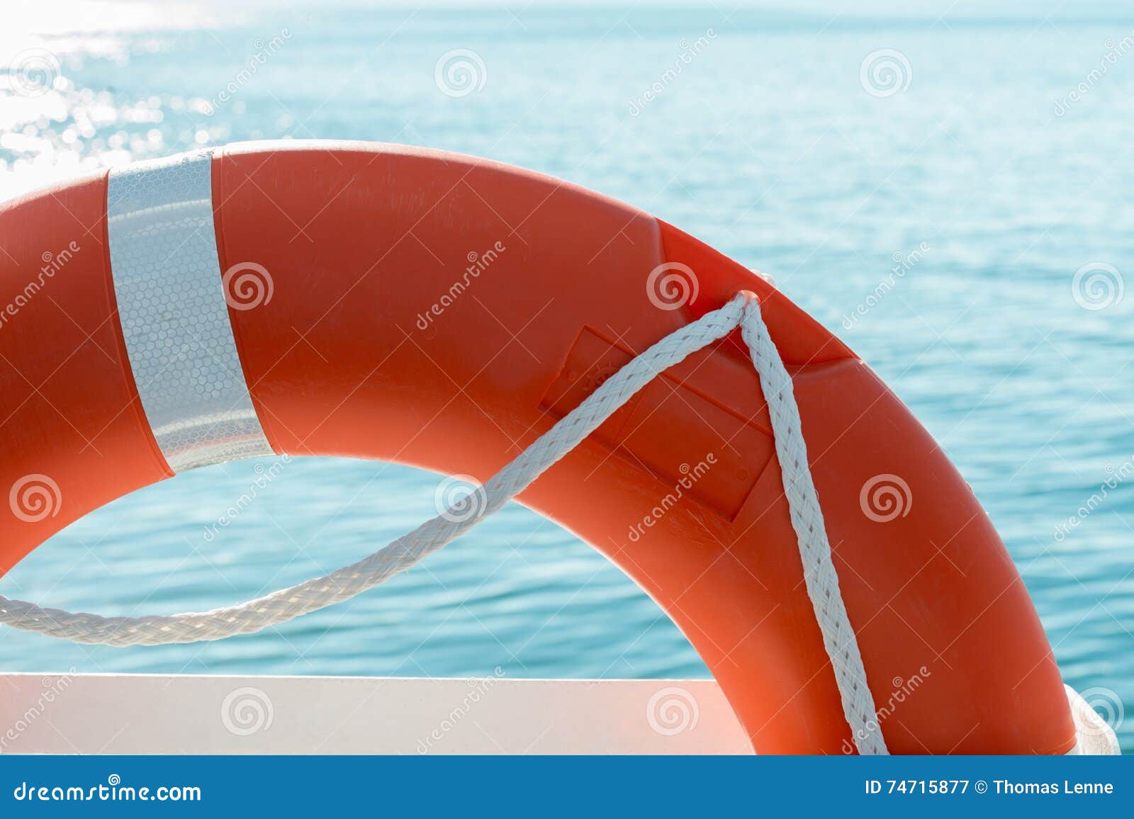 Red lifesaver on a boat stock image. Image of safety - 74715877