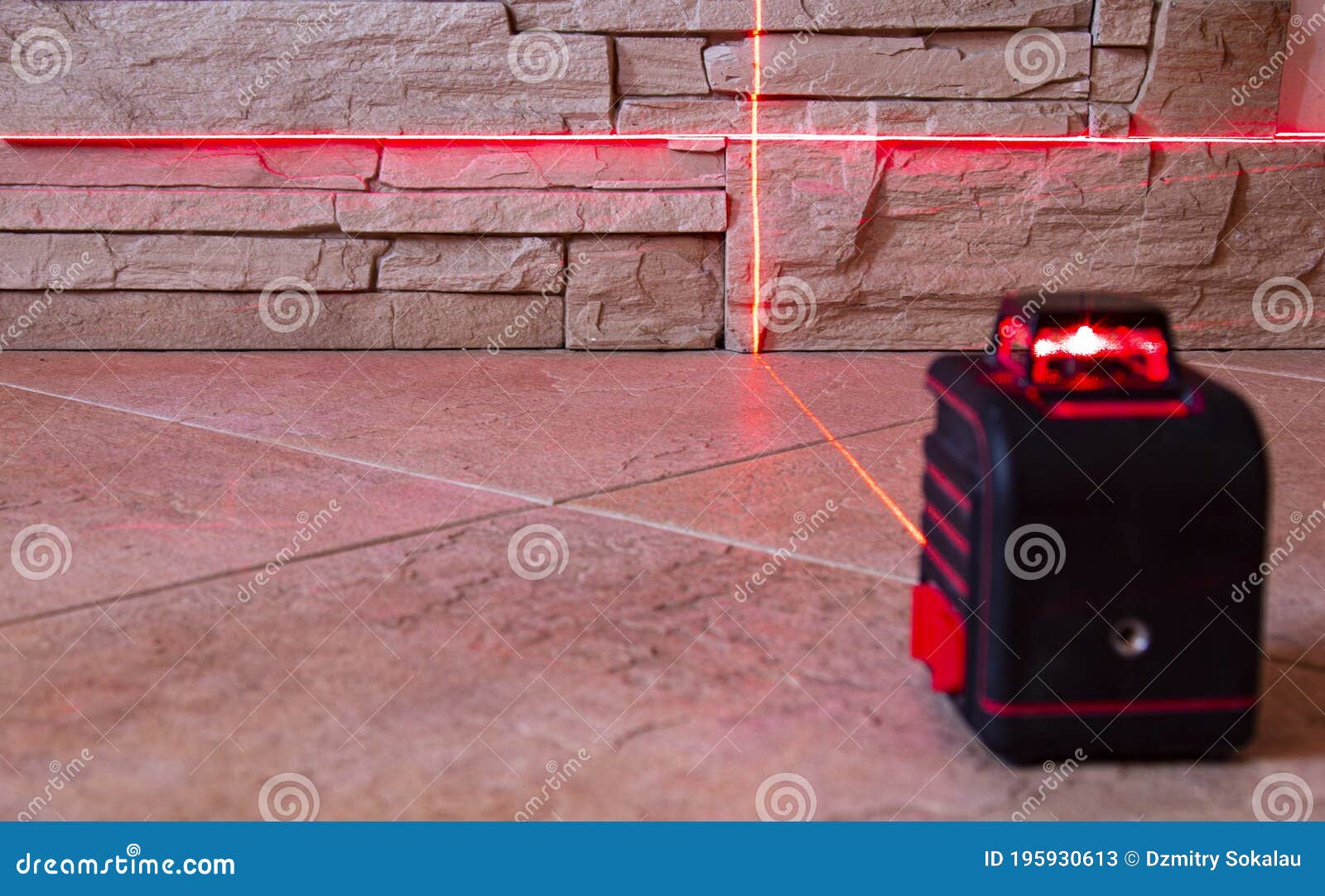 The Red Light Beams of the Laser Level Device on the Wall and Floor ...