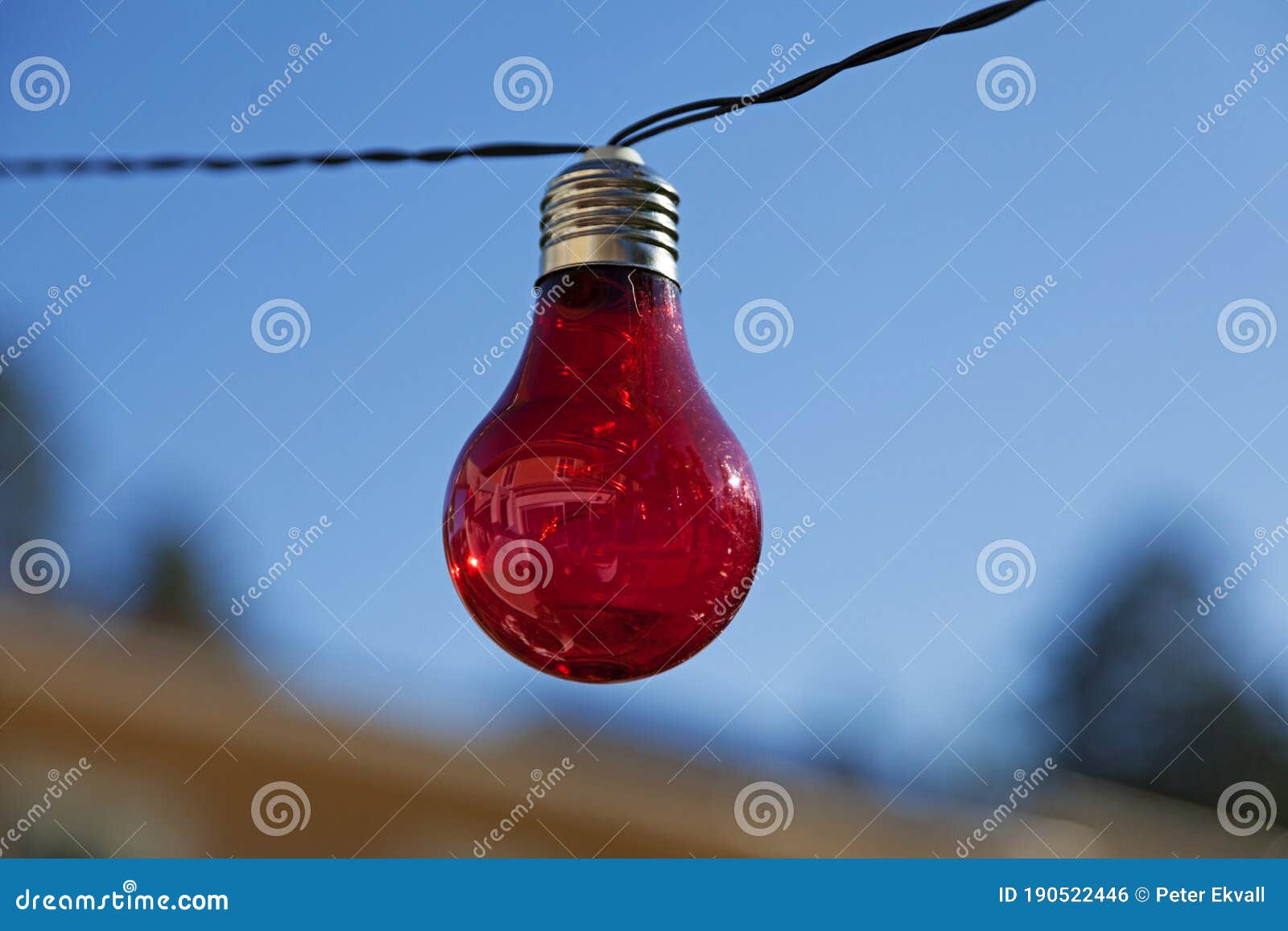 A Red Light Bulb Hanging Outdoors Stock Photo - Image of concepts ...