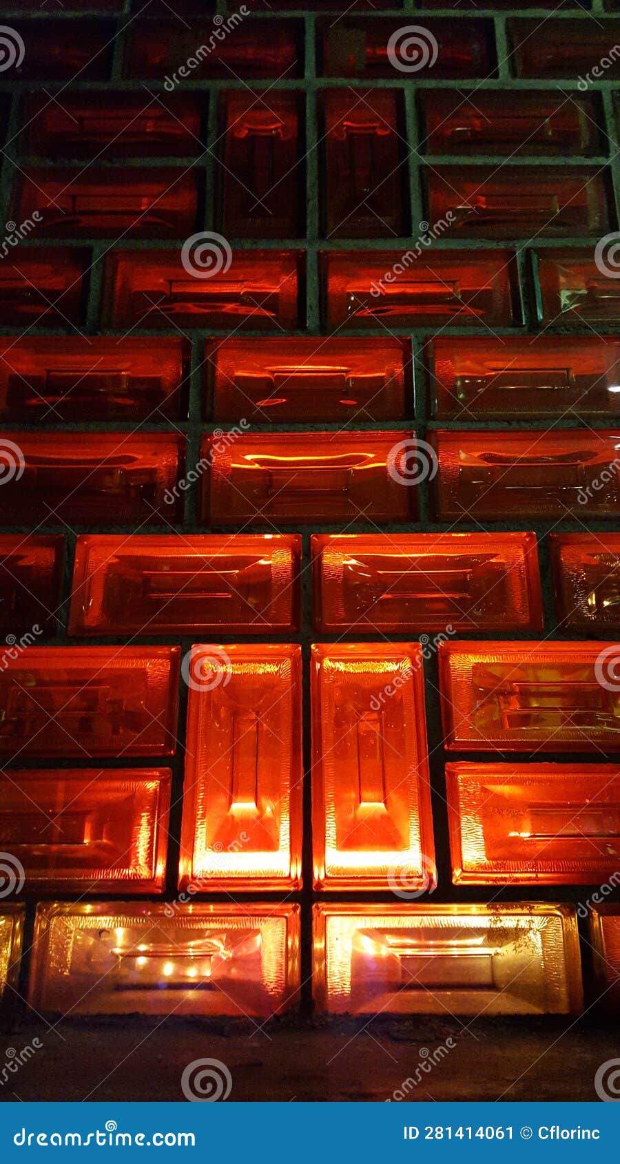 Red Light Going through a Wall of Glass Tiles Stock Image - Image of ...