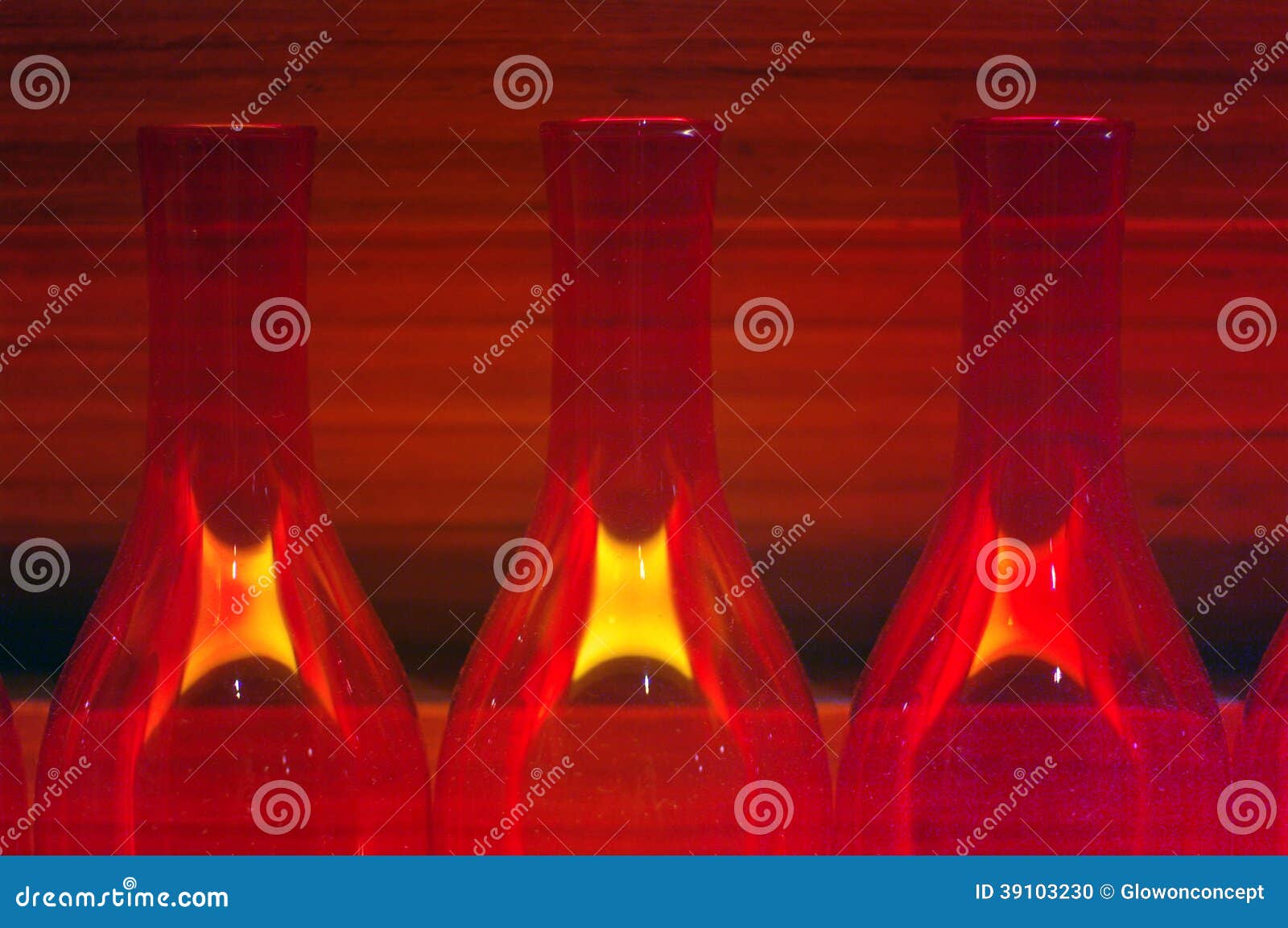 Red Light Illuminated Glass Bottles Abstract Background Stock Photo ...