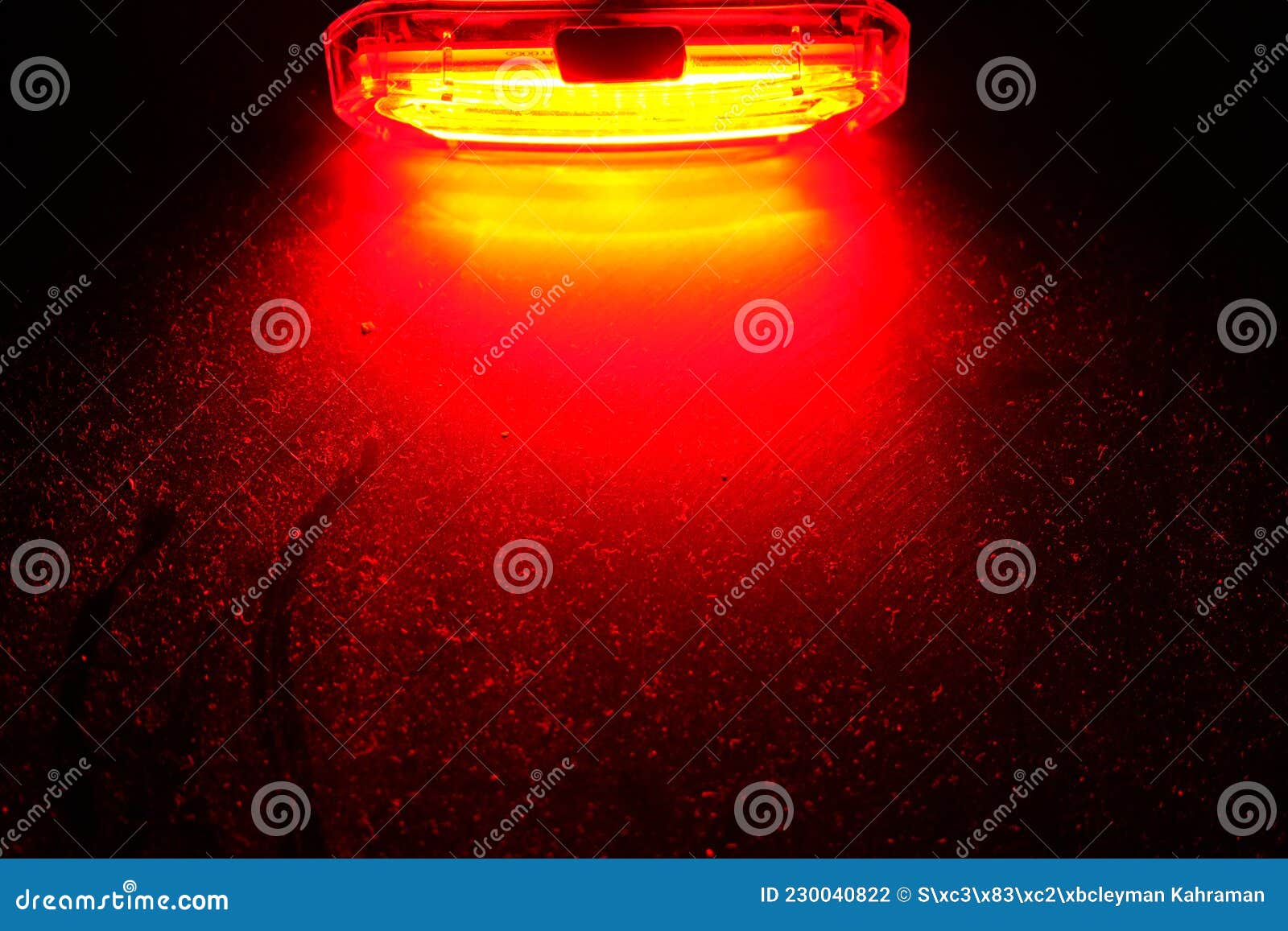 Red Light Standing on Metal Surface that is Covered by Dust and Light ...