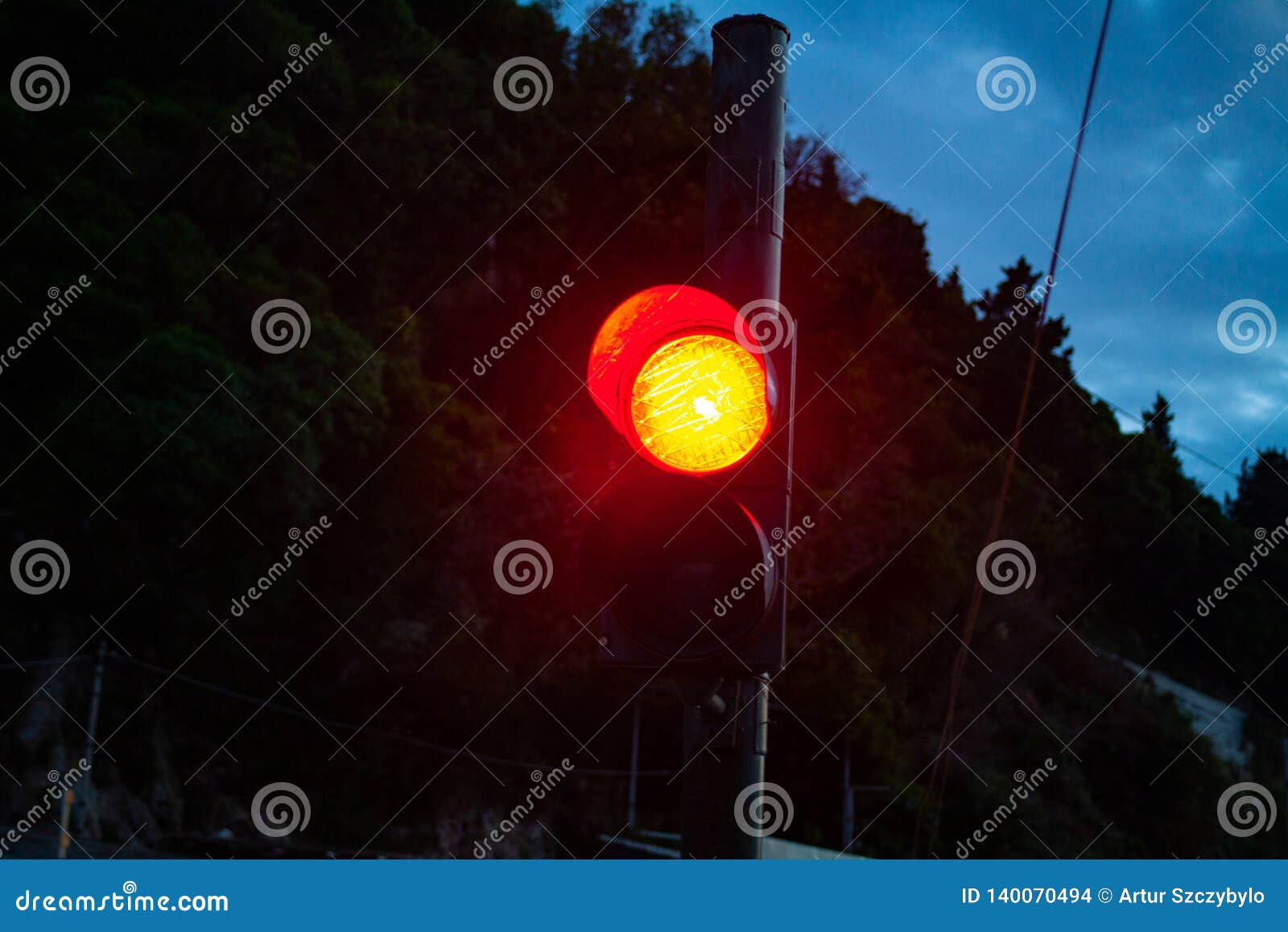 Red Light on the Traffic Lights at Night. Traffic Safety Concept with ...
