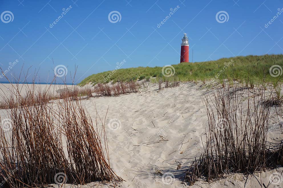 Red Lighthouse at the Beach Stock Photo - Image of dunes, tower: 30521126