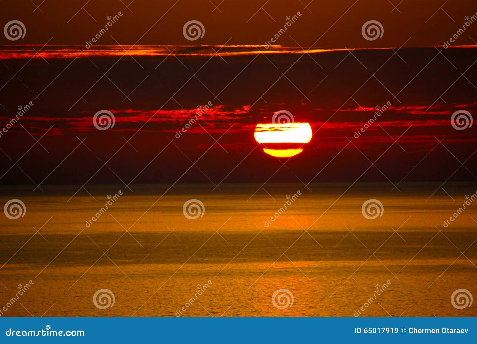 Red Lighthouse with Light Beam at Sunset. the Top Stock Image - Image ...