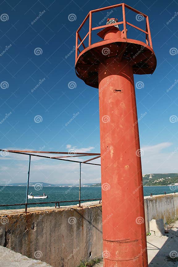 Red Lighthouse Pole Above Blue Sky Stock Photo - Image of shore ...
