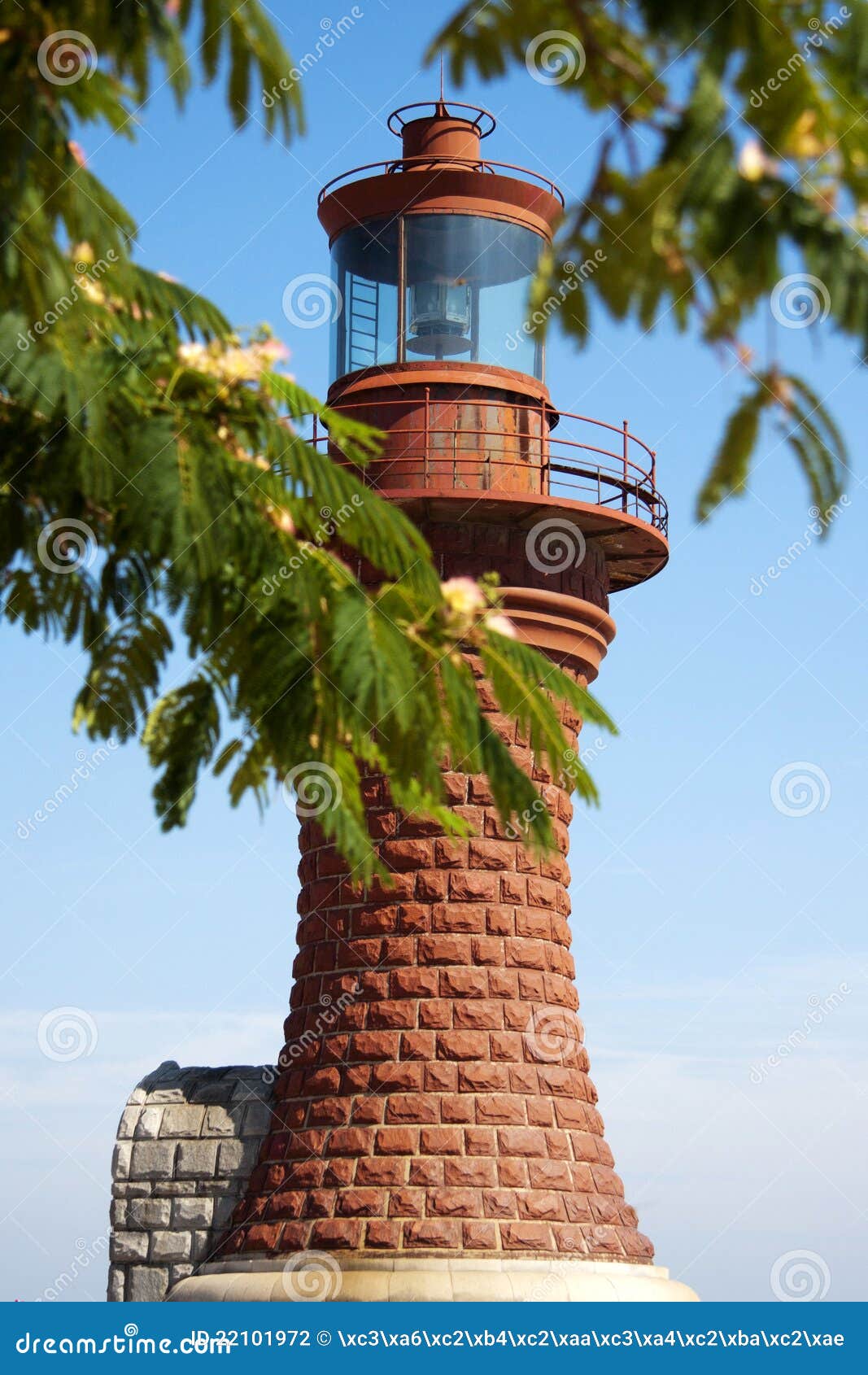 Red lighthouse and tree stock photo. Image of shipping - 22101972
