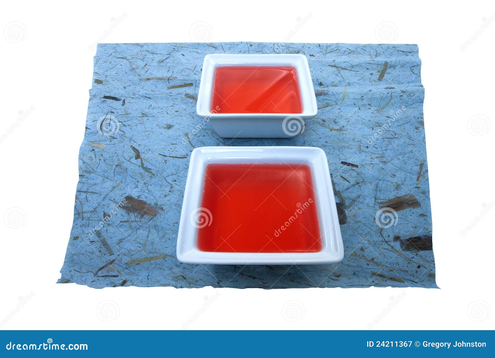 Red liquid on blue paper. stock image. Image of creative - 24211367