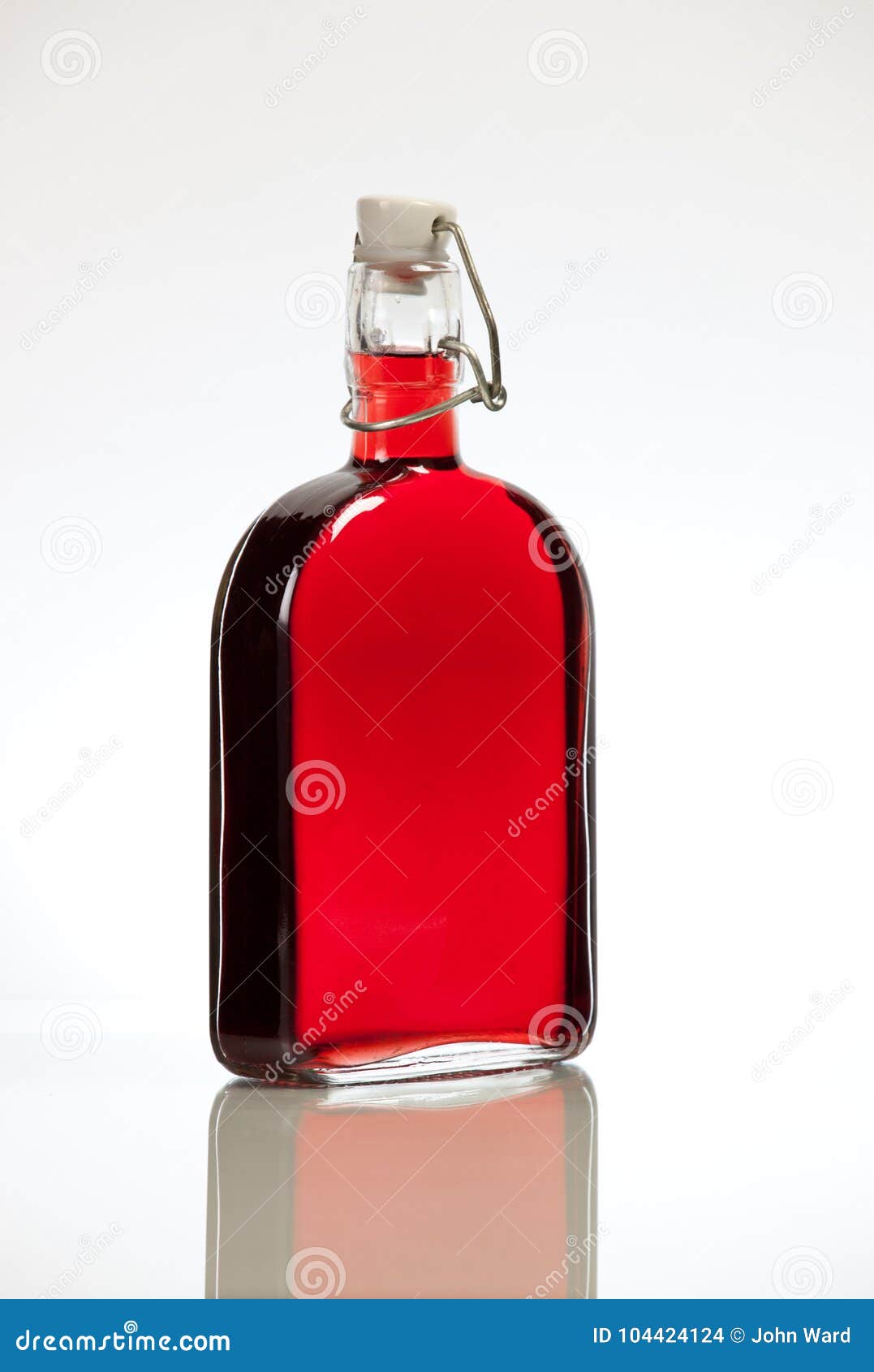 Red liquid in bottle stock photo. Image of dangerous - 104424124
