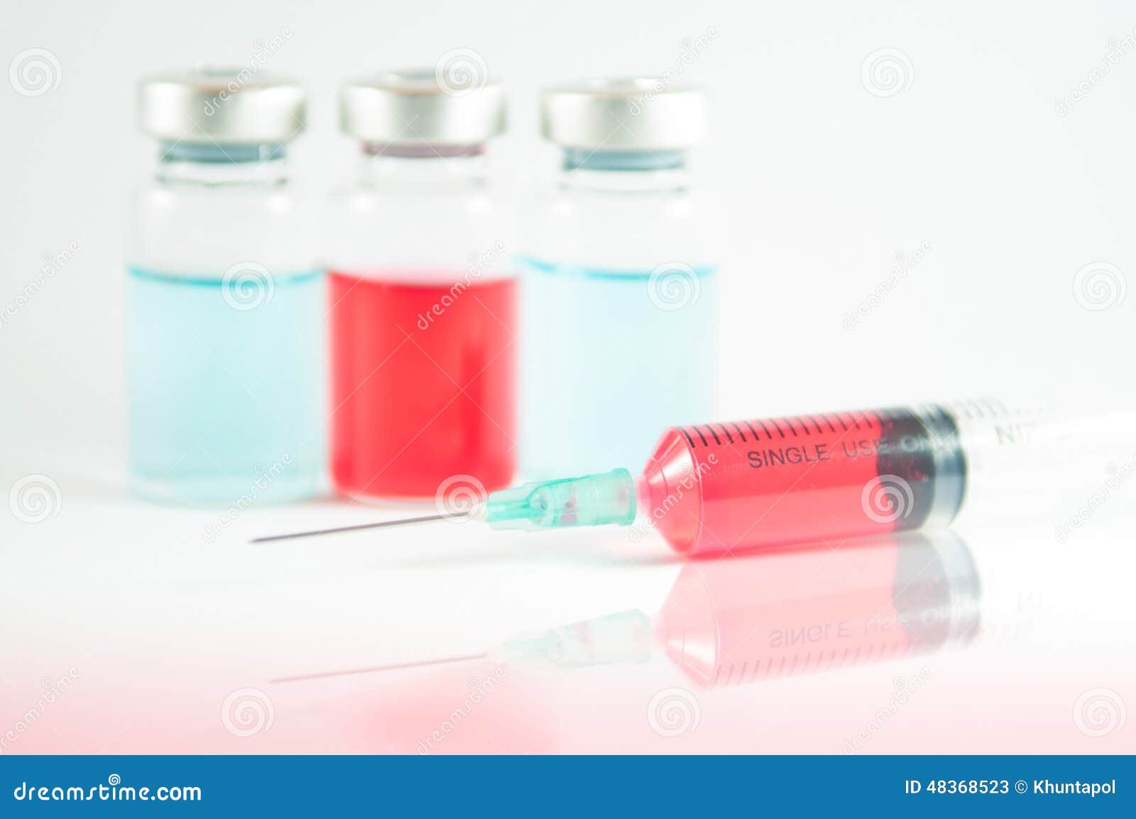Red Liquid in Injection Syringe and Vials Stock Image - Image of ...