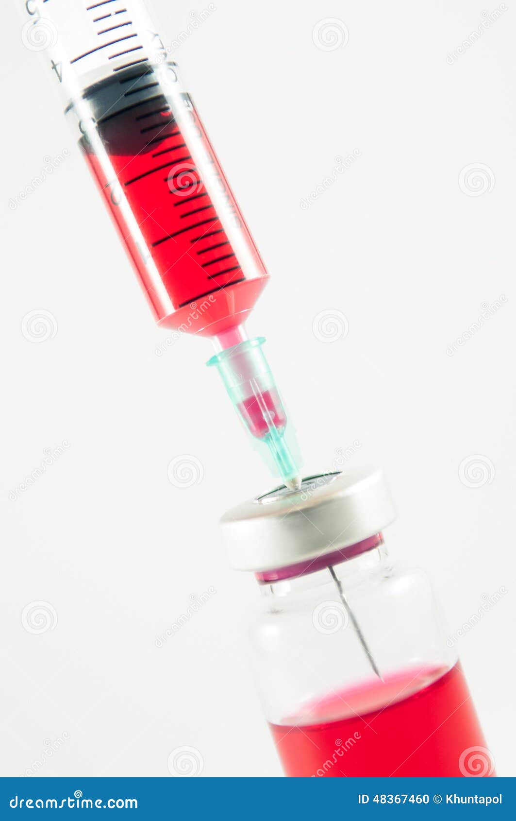 Red Liquid in Injection Syringe and Vials Background Stock Photo ...