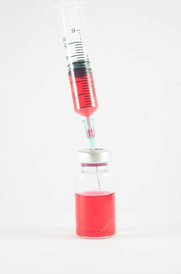Red Liquid in Injection Syringe and Vials Background Stock Image ...