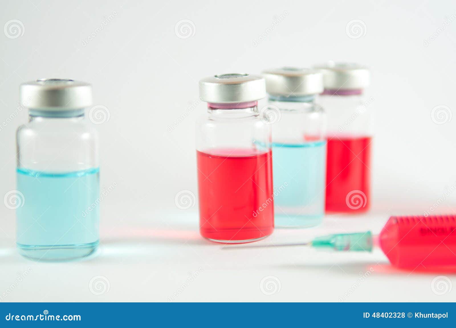Red Liquid in Injection Syringe and Vials Stock Photo - Image of ...