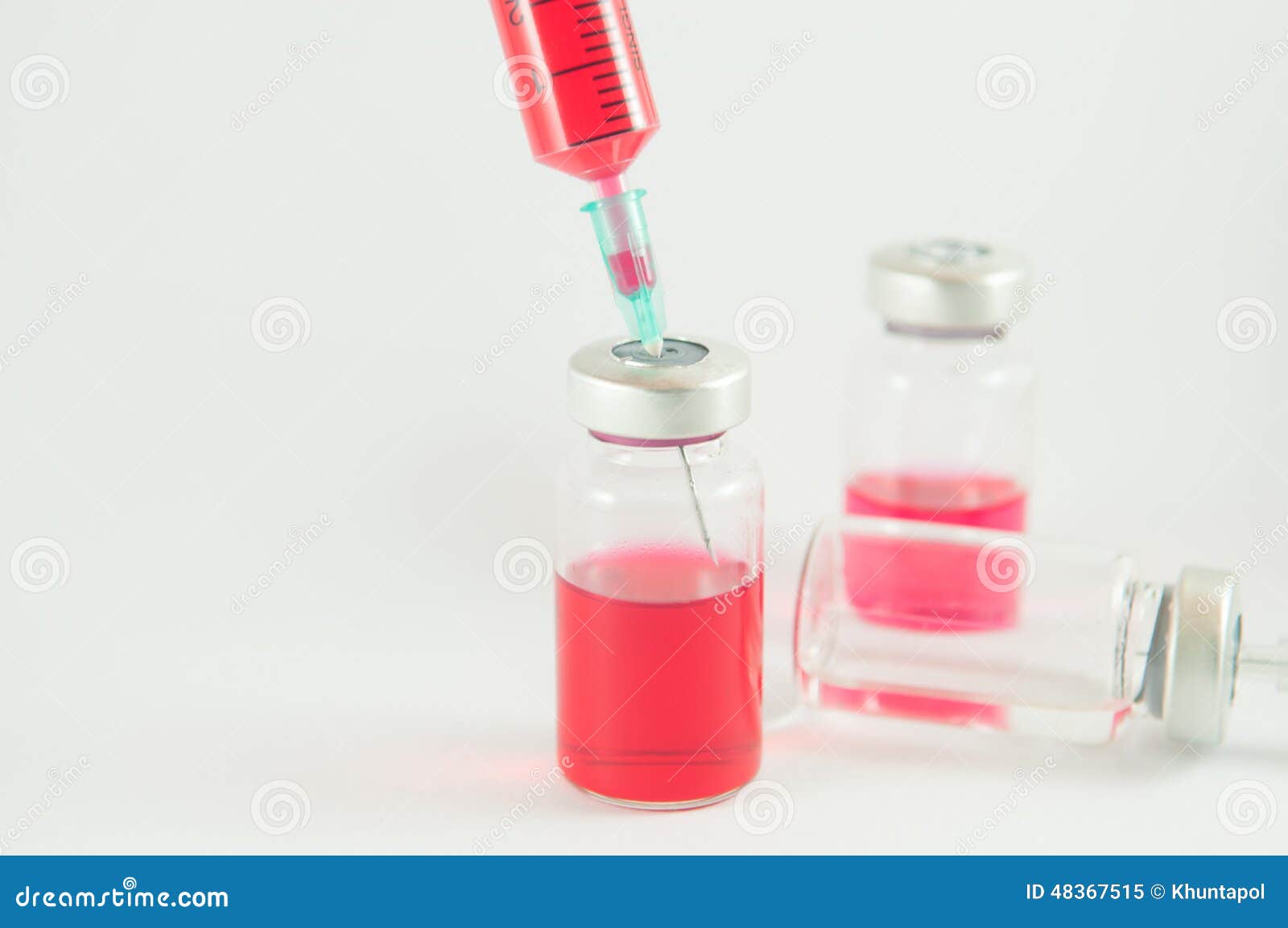 Red Liquid in Injection Syringe and Vials Stock Image - Image of vials ...