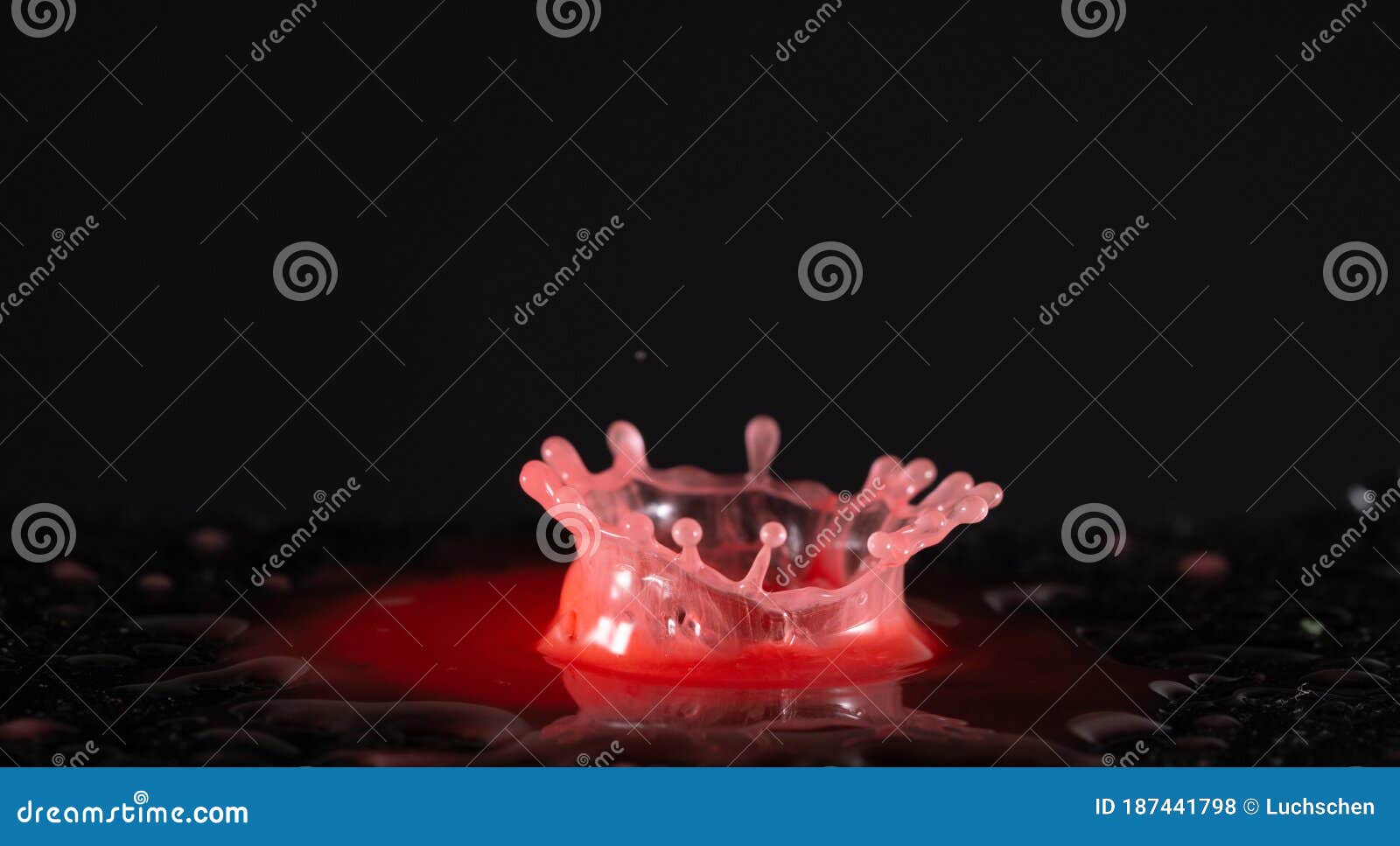 Red Liquid Ink Splash on Black Background Stock Photo - Image of ...