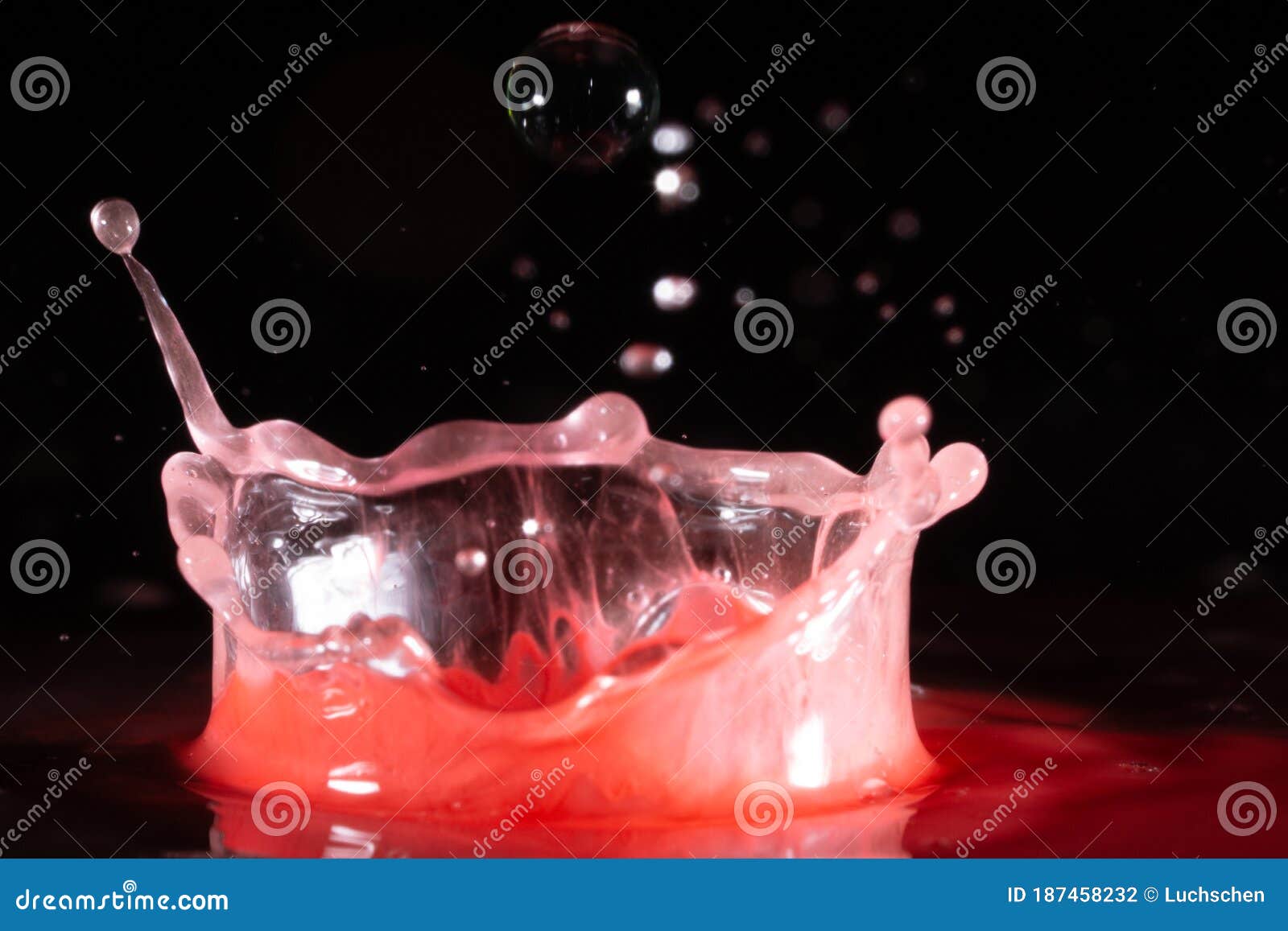 Red Liquid Ink Splash on Black Background Stock Photo - Image of bubble ...