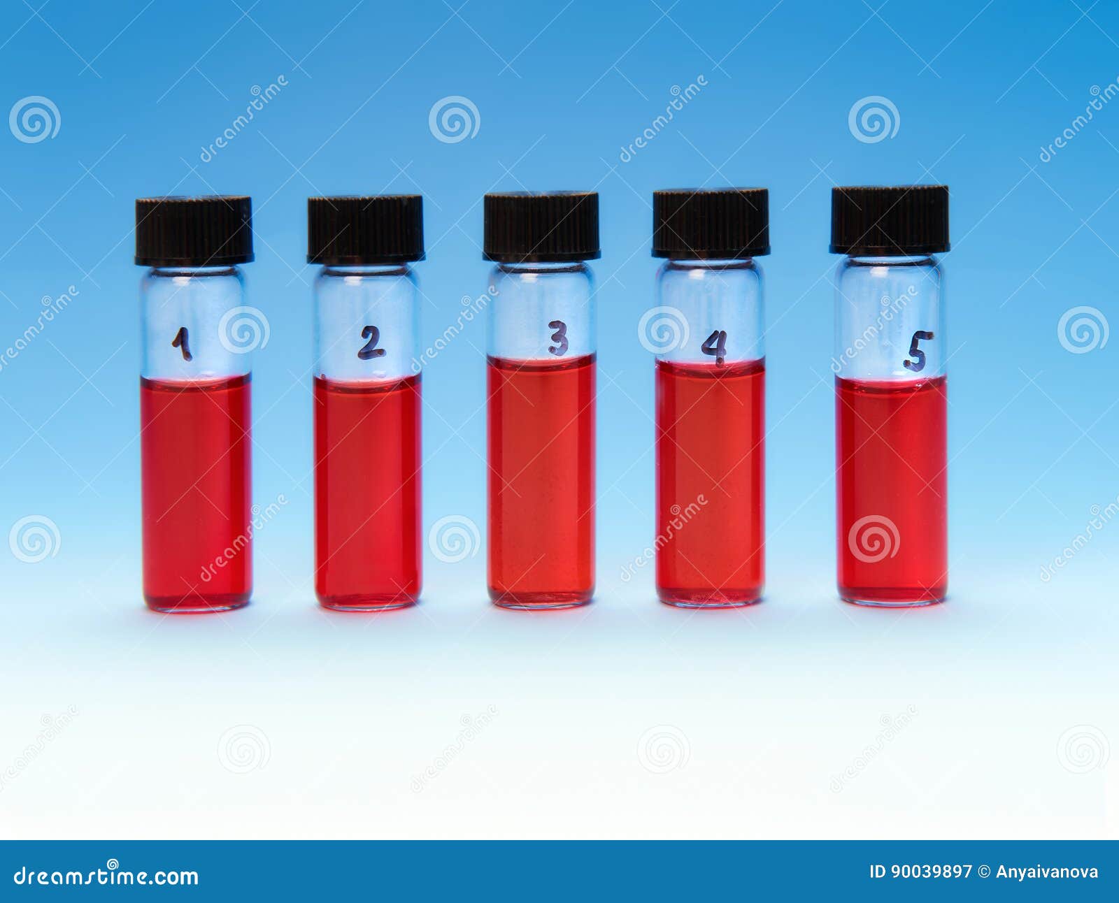 Red Liquid Samples in a Transparent Plastic Tray on Blue Stock Image ...