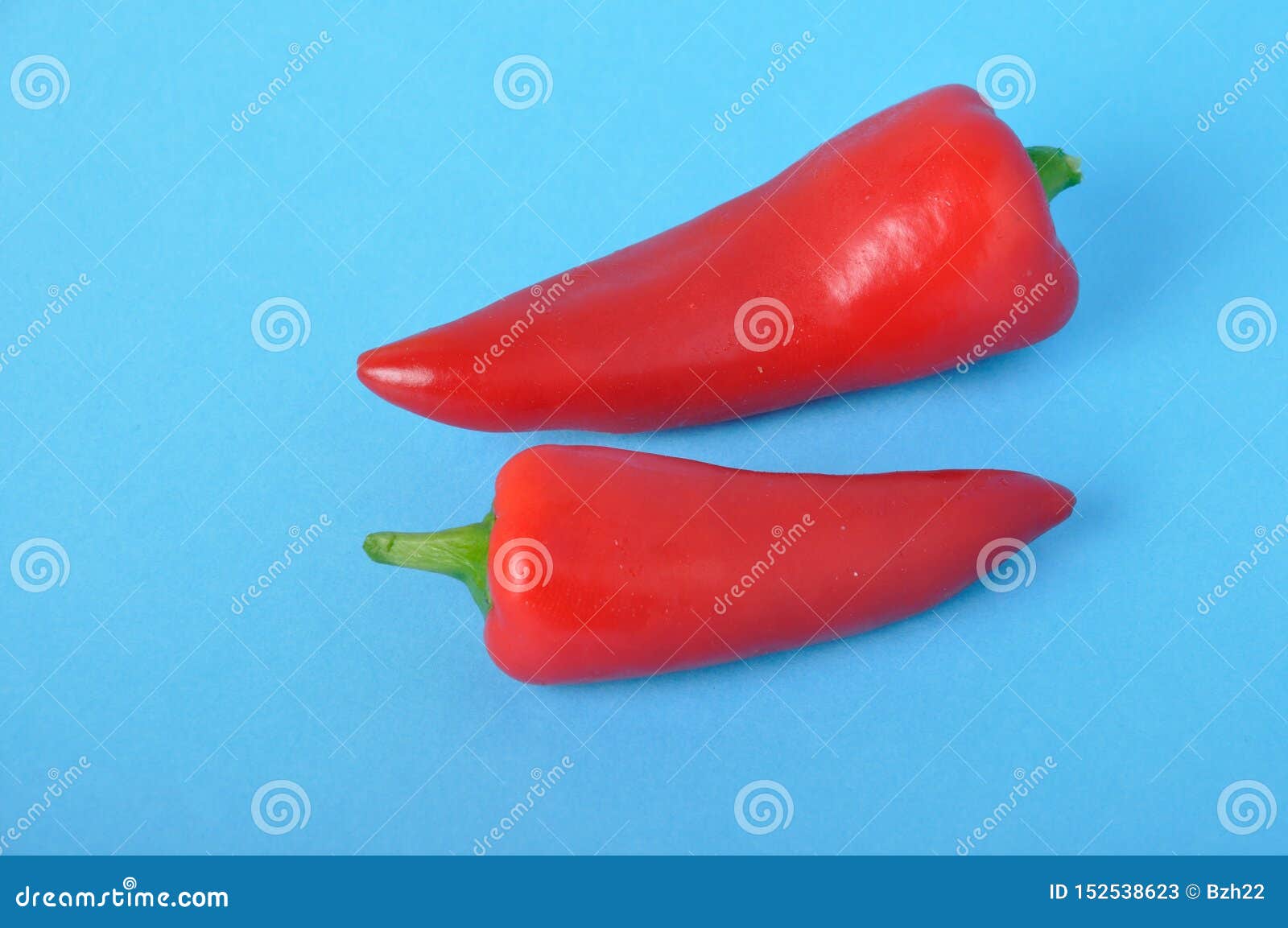 Red Long Pepper on Blue Bacground Stock Image - Image of studio, shot ...