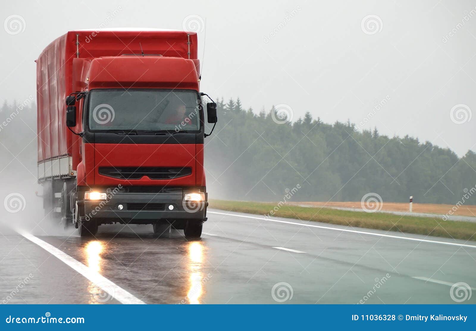 Red lorry on wet road stock photo. Image of motor, interstate - 11036328