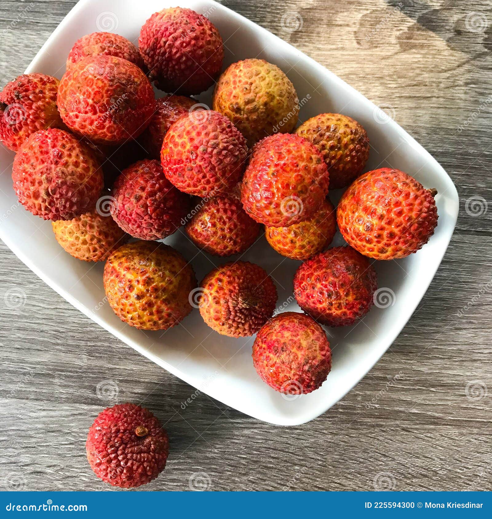 Red Lychee on the Plate stock photo. Image of source - 225594300