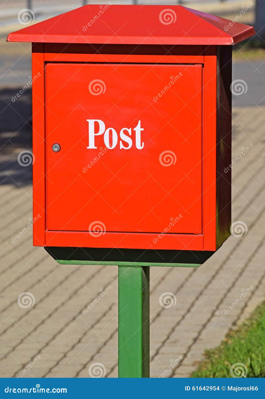 Red mail box on the street stock photo. Image of front - 61642954