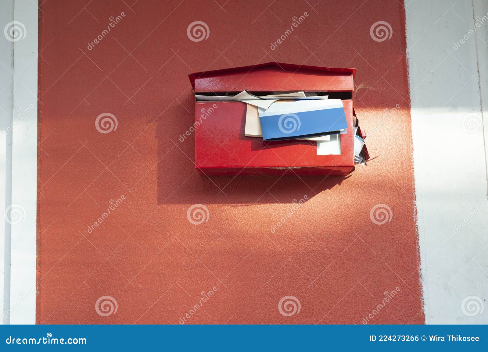 Red Mailbox with Documents Overflowing Stock Photo - Image of office ...