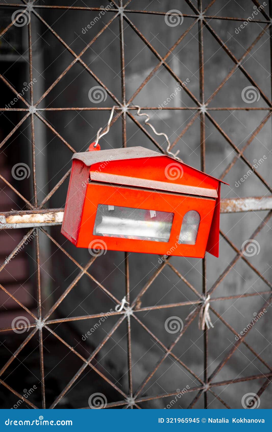 Red Mailbox on an Iron Lattice Gate. Logistics and Mail Stock Image ...