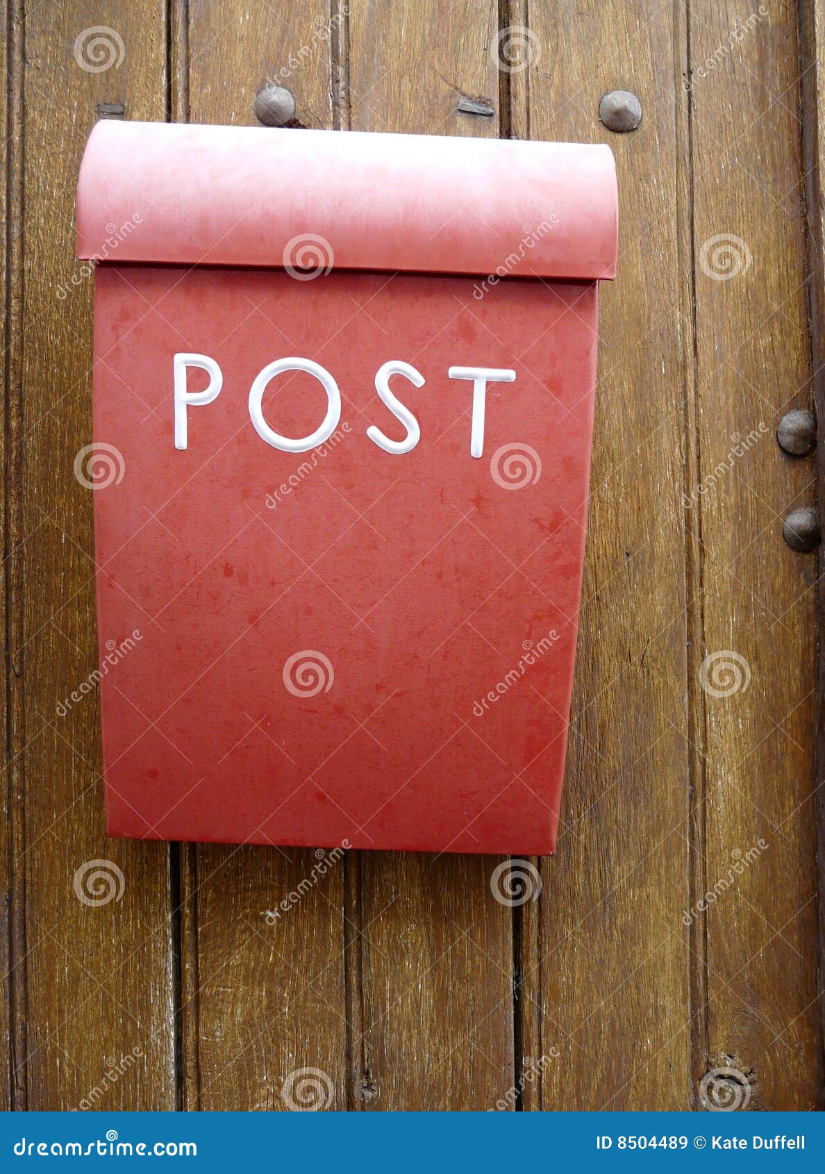 Red Mailbox on a Wooden Door Stock Image - Image of container, send ...