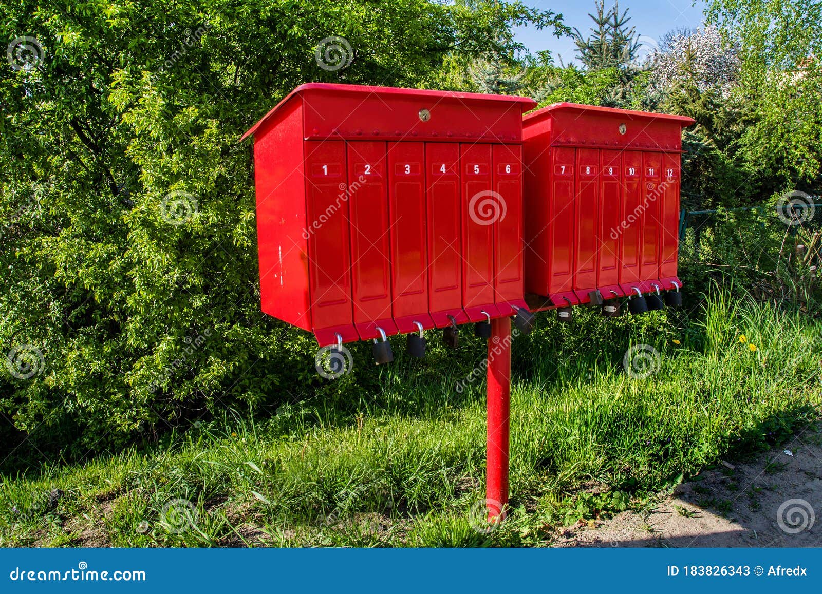Red Mailboxes with Numbers by the Road. Post Office in Poland Stock ...