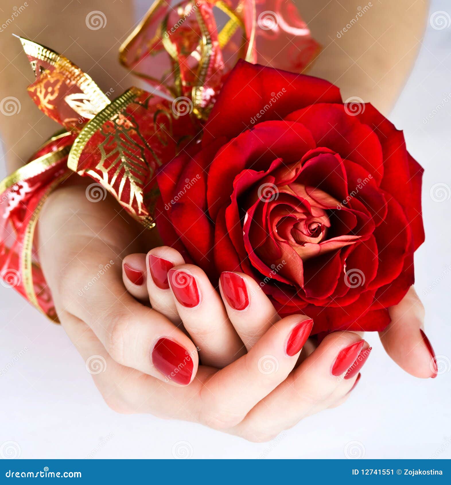 Red Manicure with Golden Ribbon and Rose Stock Image - Image of flower ...