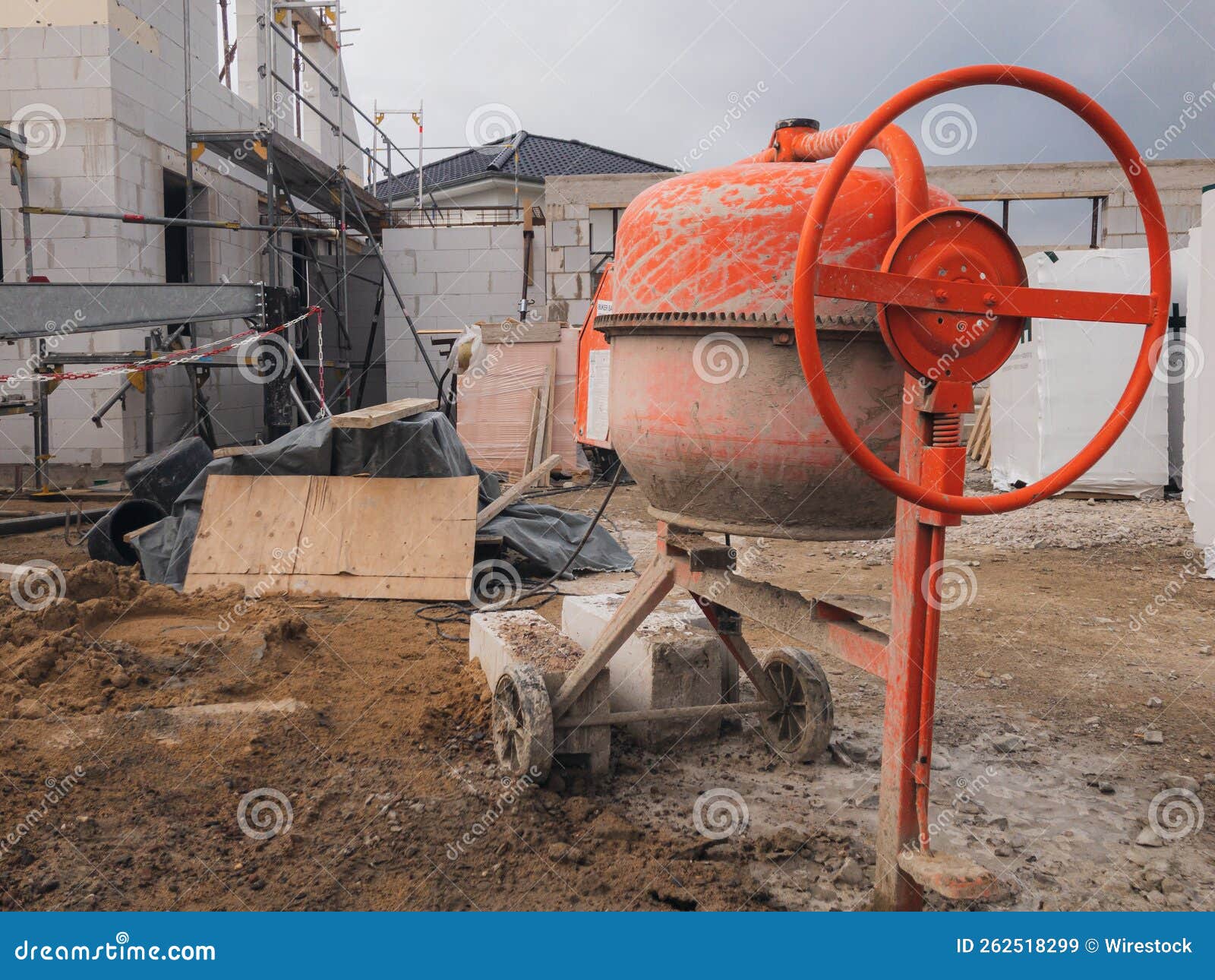 Red Manual Cement Mixer in a Construction Site Stock Image - Image of ...