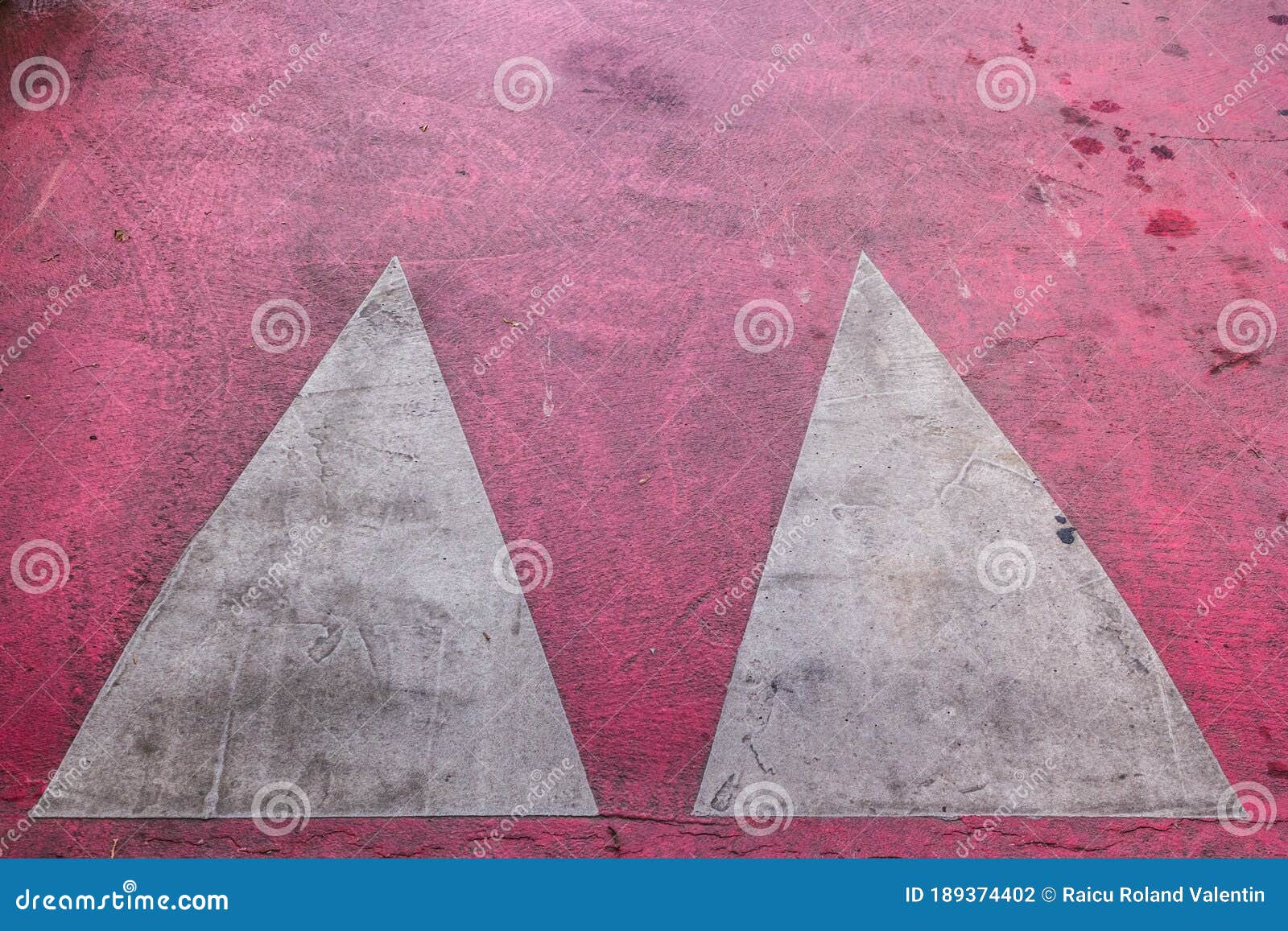Red Marked Speed Bump with White Triangles Stock Photo - Image of mark ...
