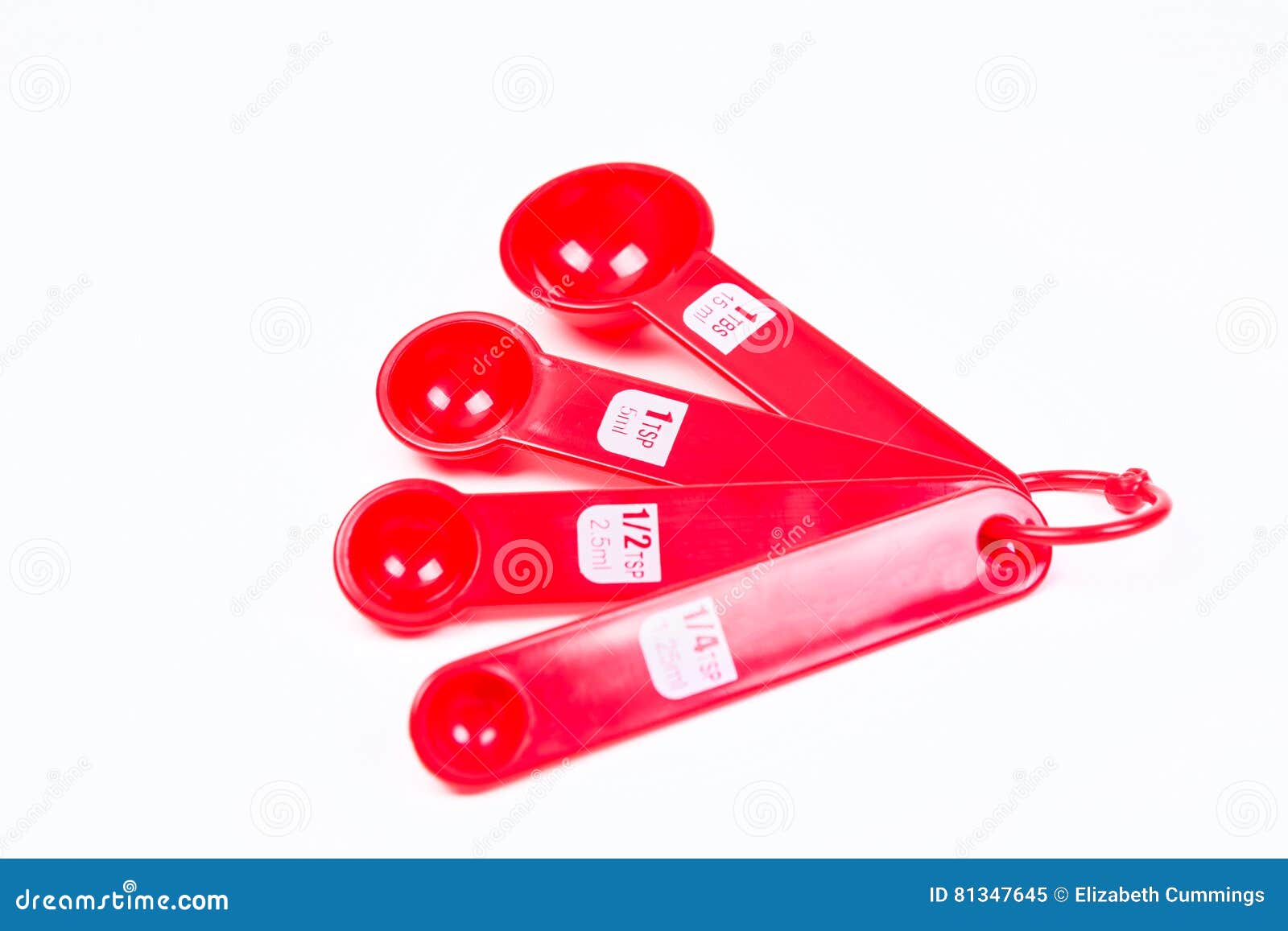 Red measuring spoons stock image. Image of tbsp, assorted - 81347645