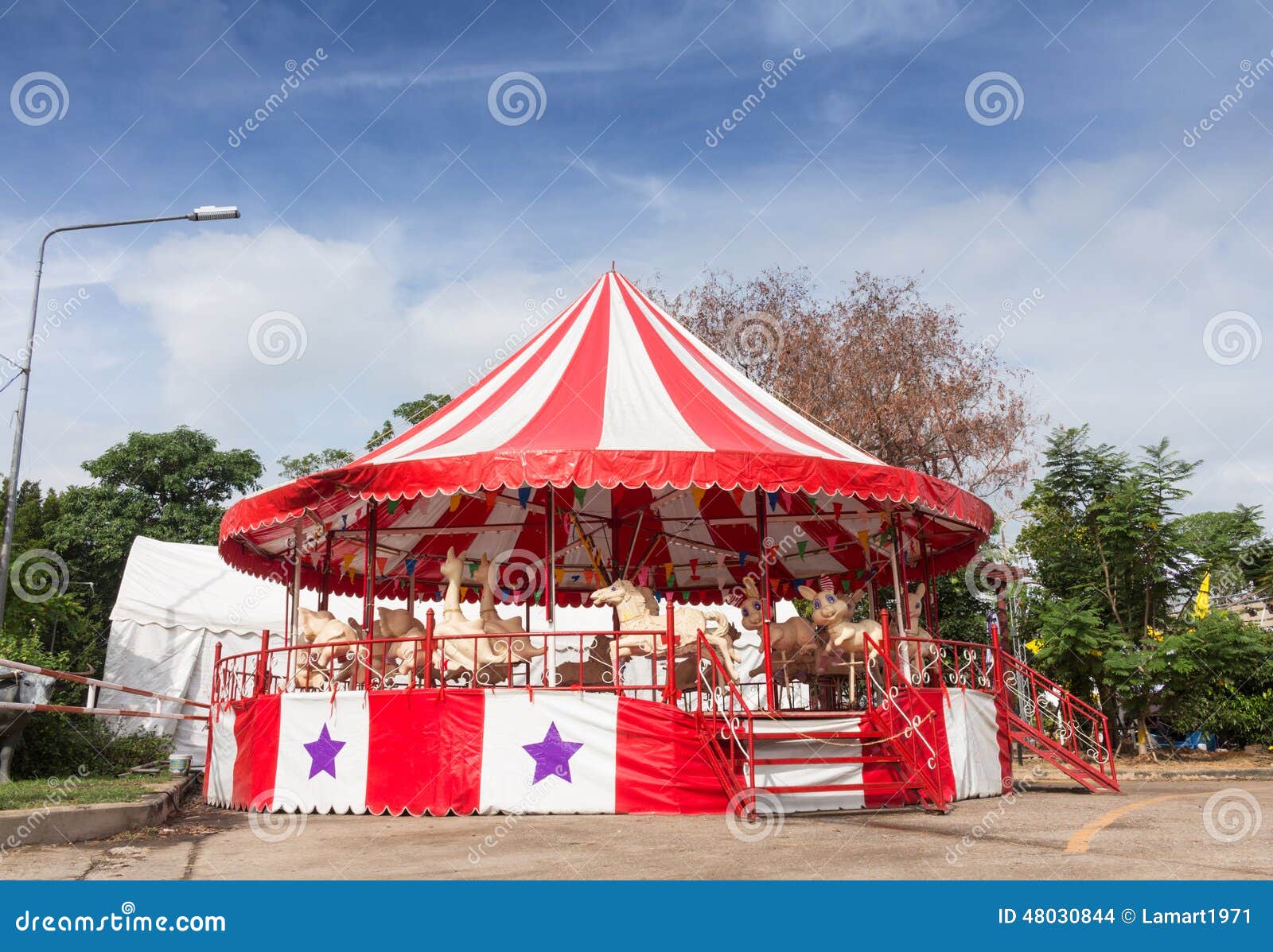 Red merry-go-round stock photo. Image of happiness, fast - 48030844