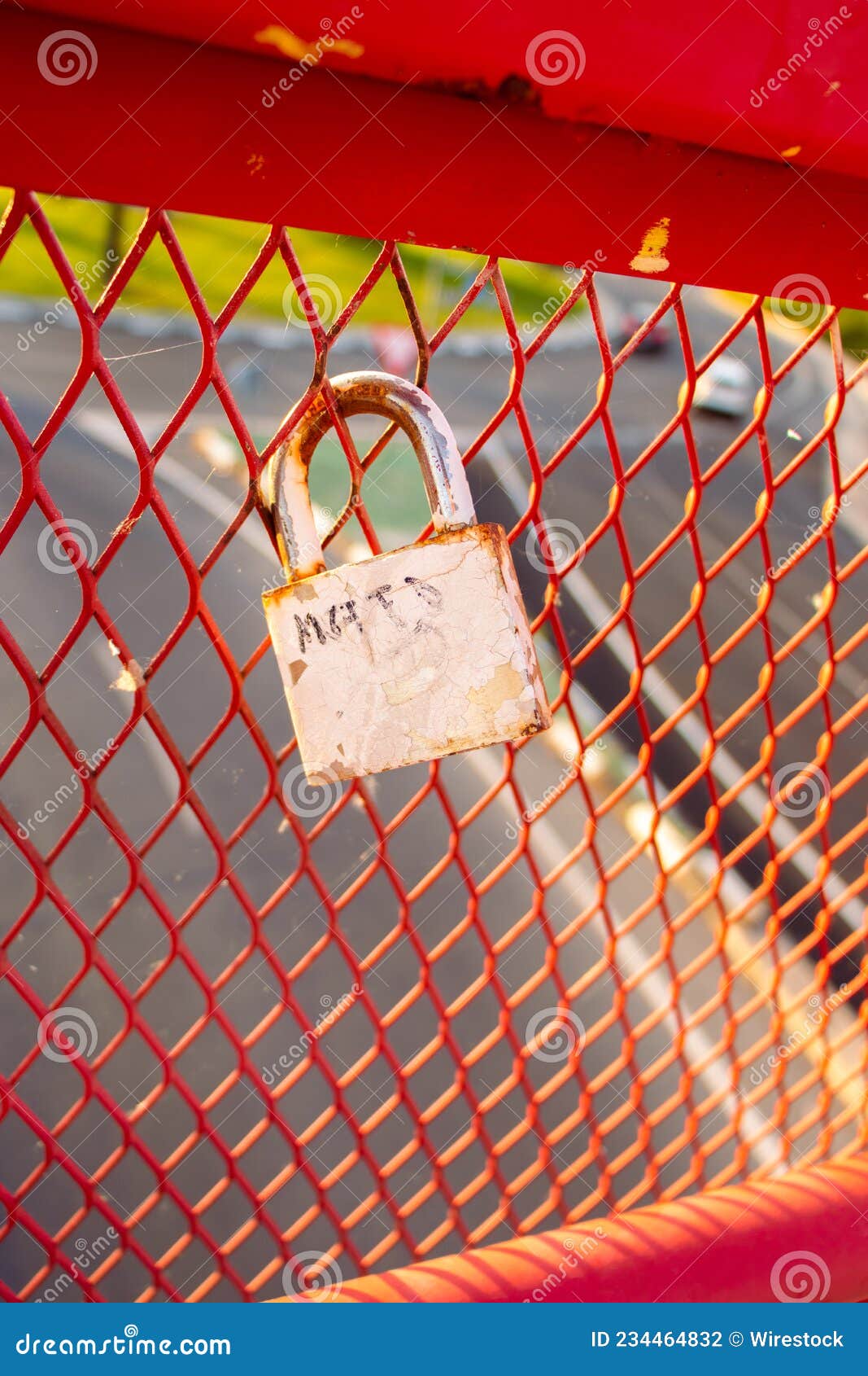 Red Mesh Fence with Padlock Stock Photo - Image of safety, padlock ...