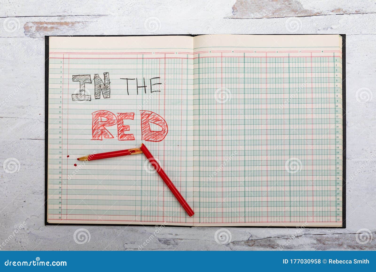 In the Red Message Written in Red Broken Pencil in Accounting Ledger ...